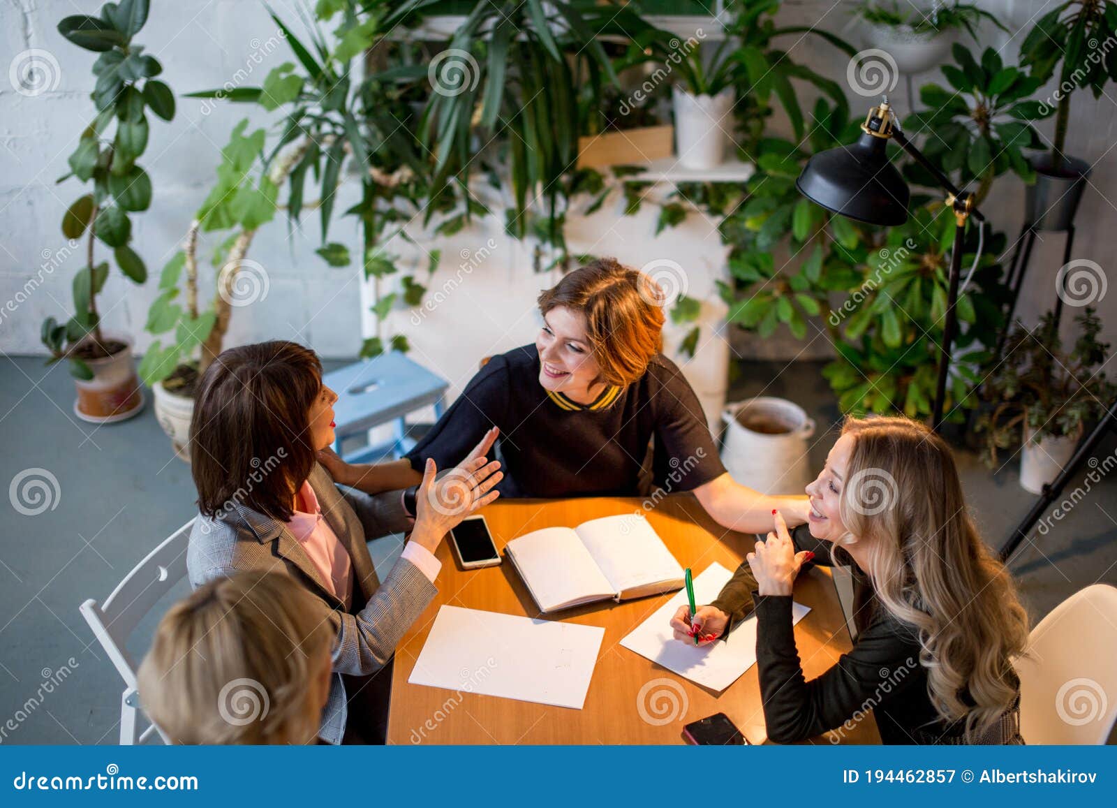 Working Overtime Concept. Group of Female Business Team Working Late at ... Working Overtime Concept. Group of Female Business Team Working Late at ...