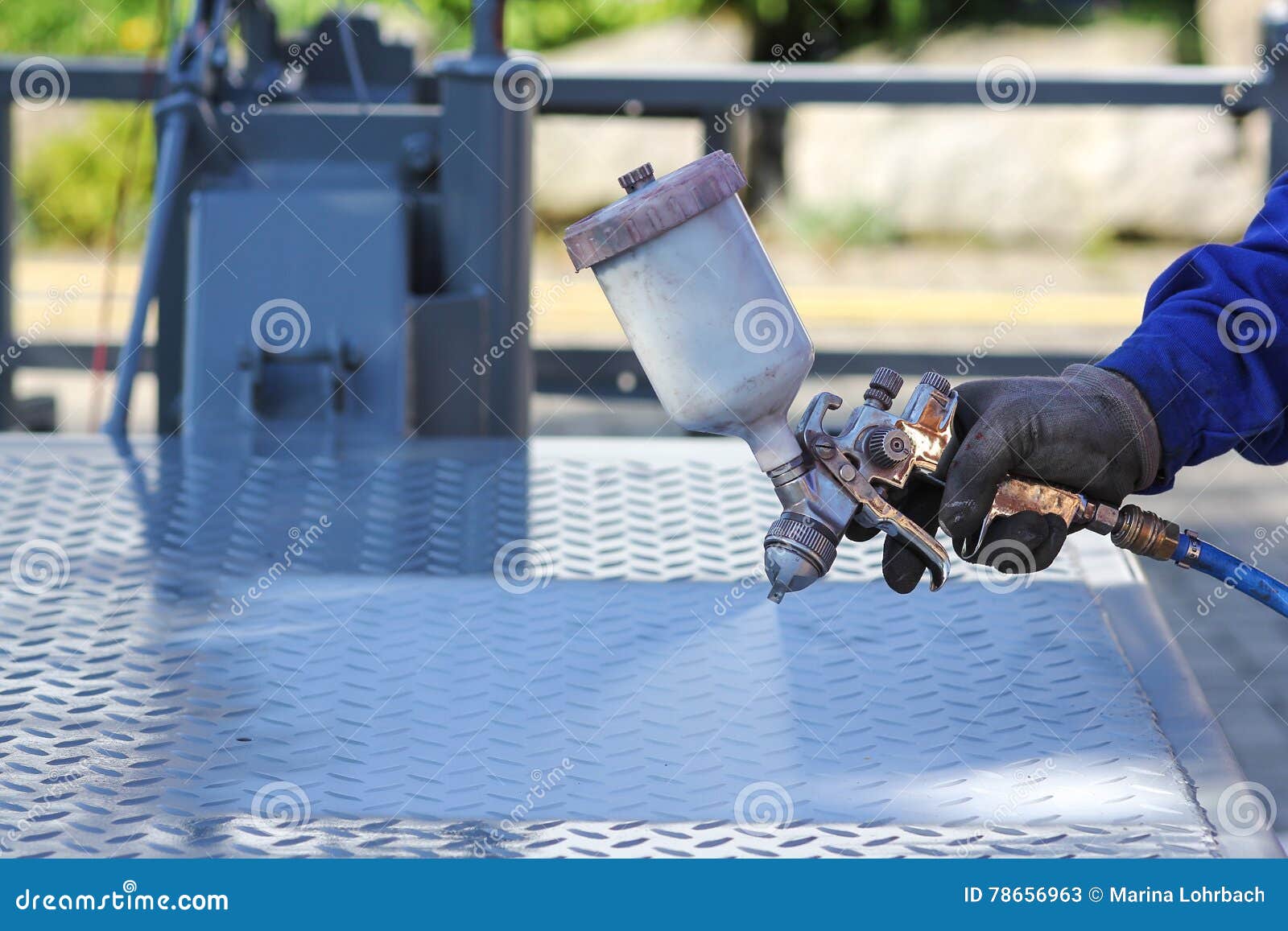 Working with Paint Spray Gun Stock Image - Image of checkered, painting ...