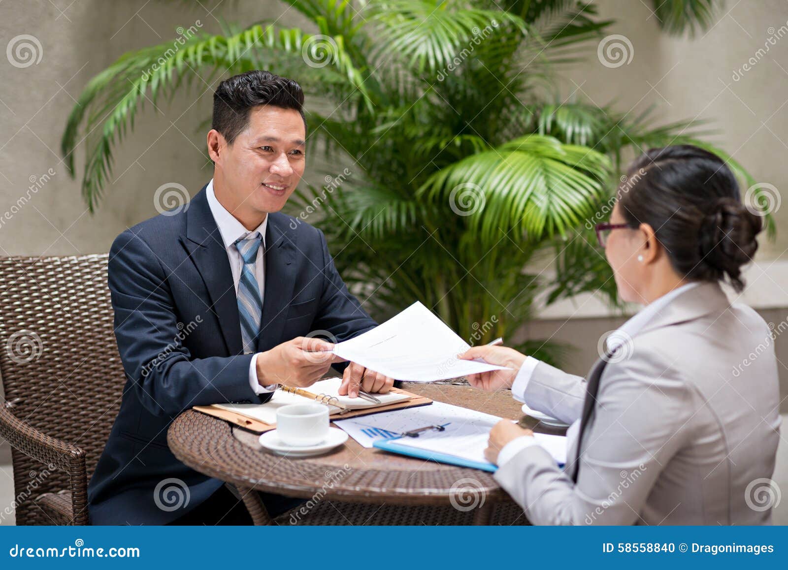 Working with papers stock photo. Image of idea, giving - 58558840