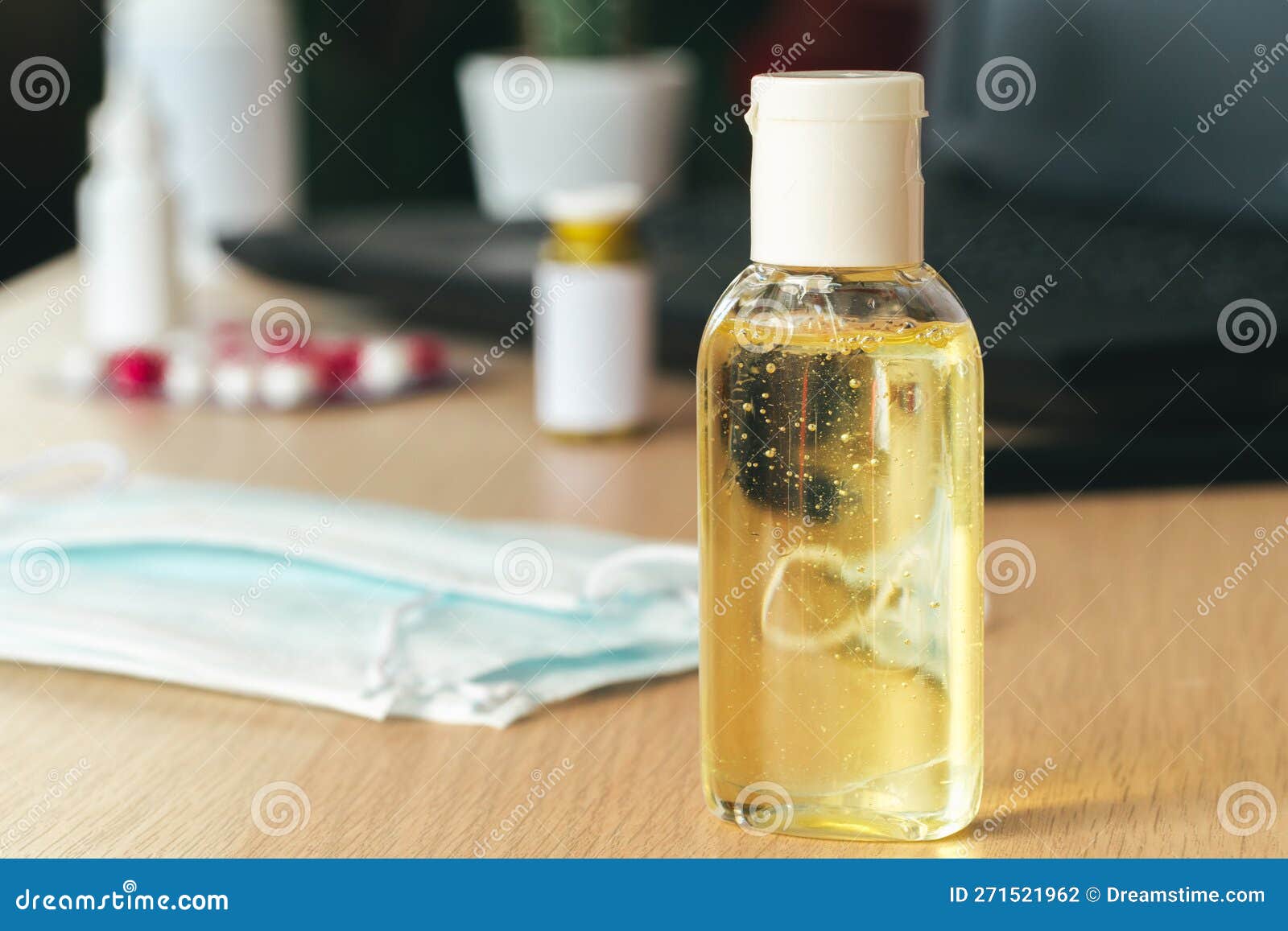 Working Place Table with Small Bottle of Antibacterial Sanitizer Stock ...