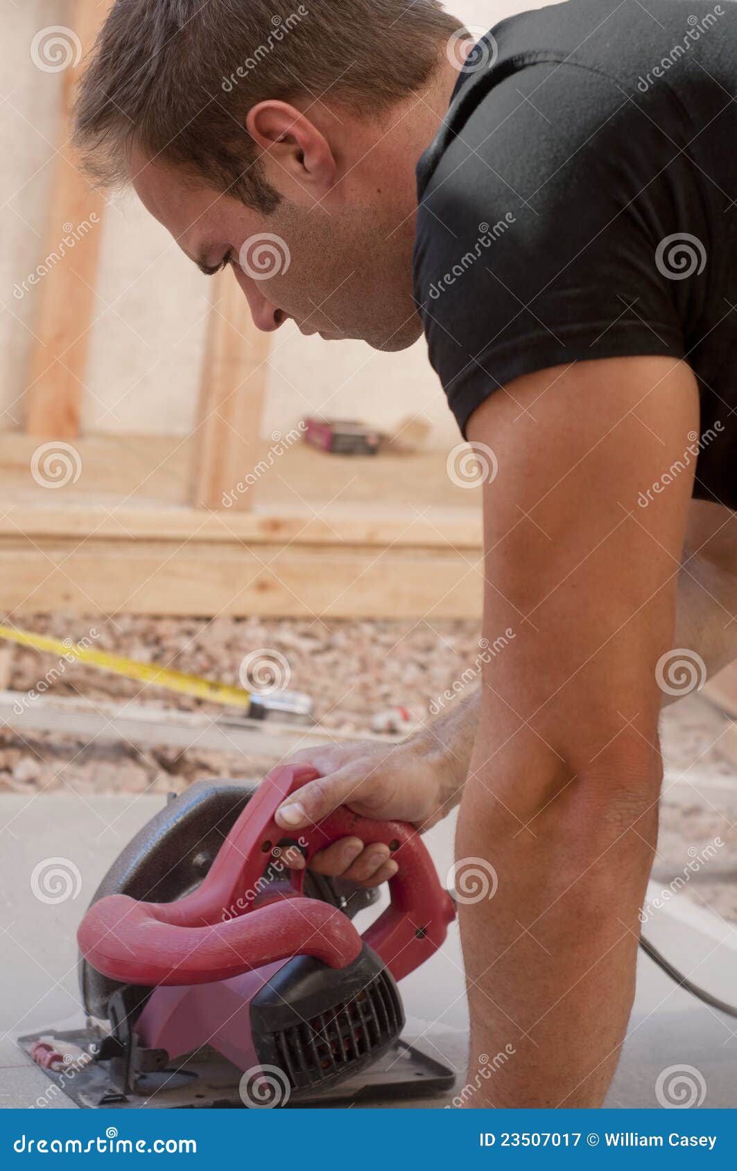 Working with a power saw stock image. Image of construction - 23507017