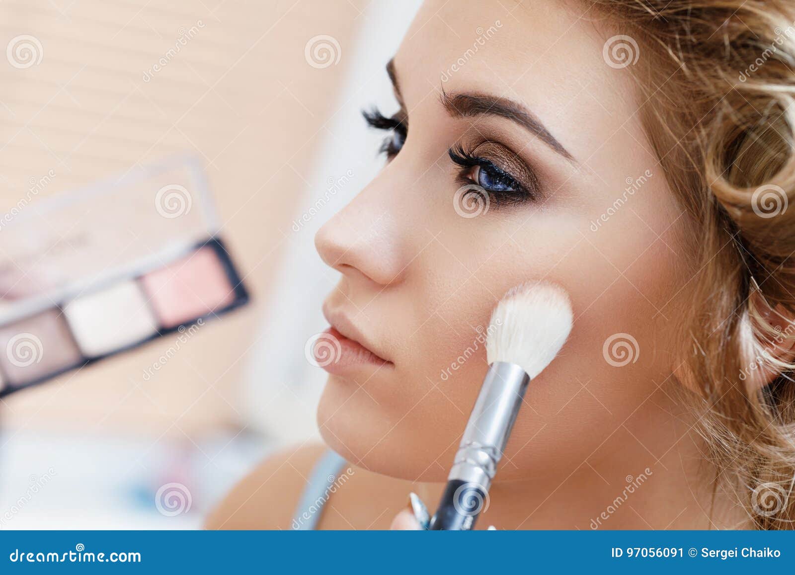 Working Process Applying Makeup on the Face of a Girl Stock Image ...