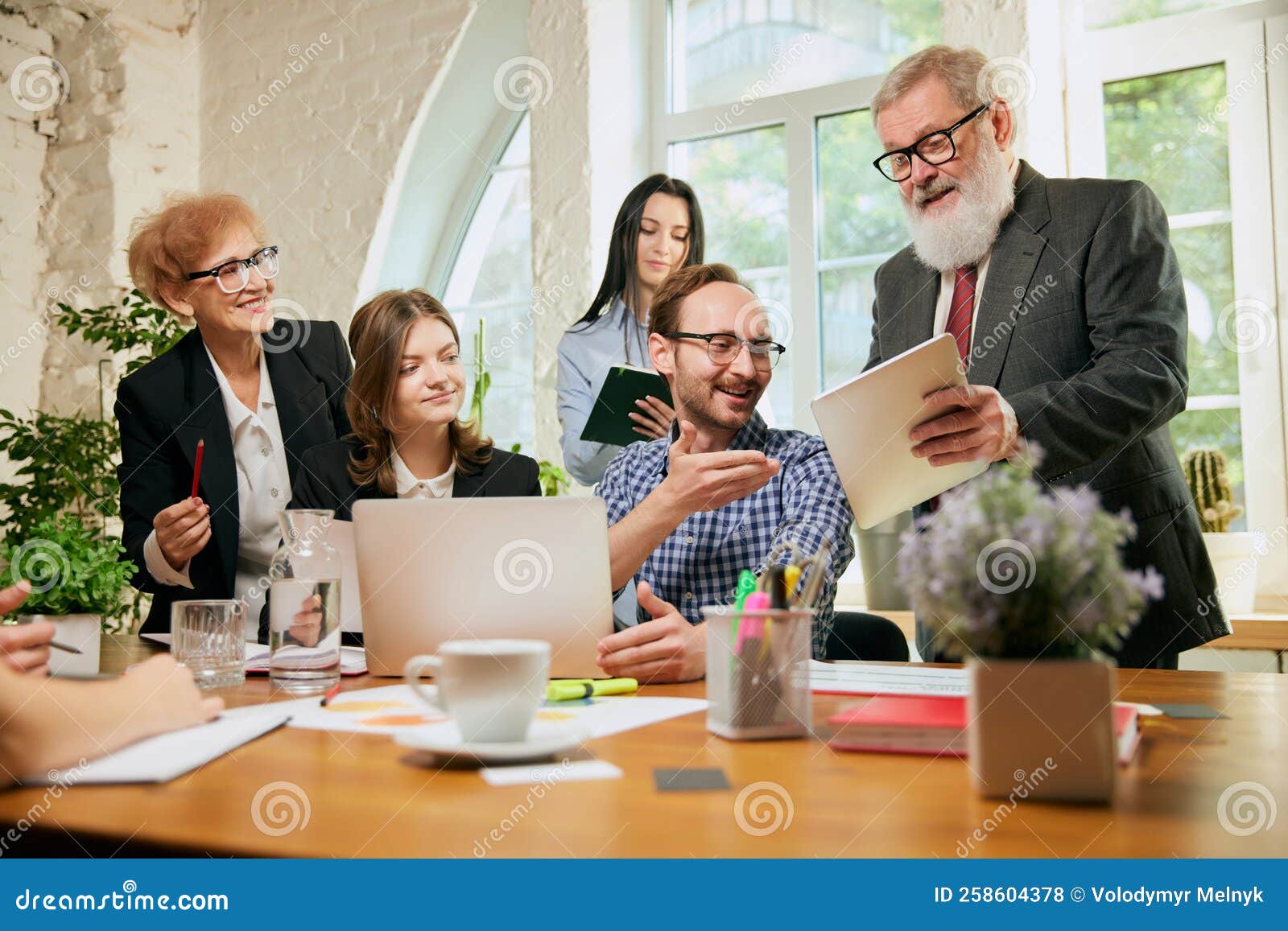 Group of Mixed Ages People Talking, Working with Colleagues, Co-workers ...