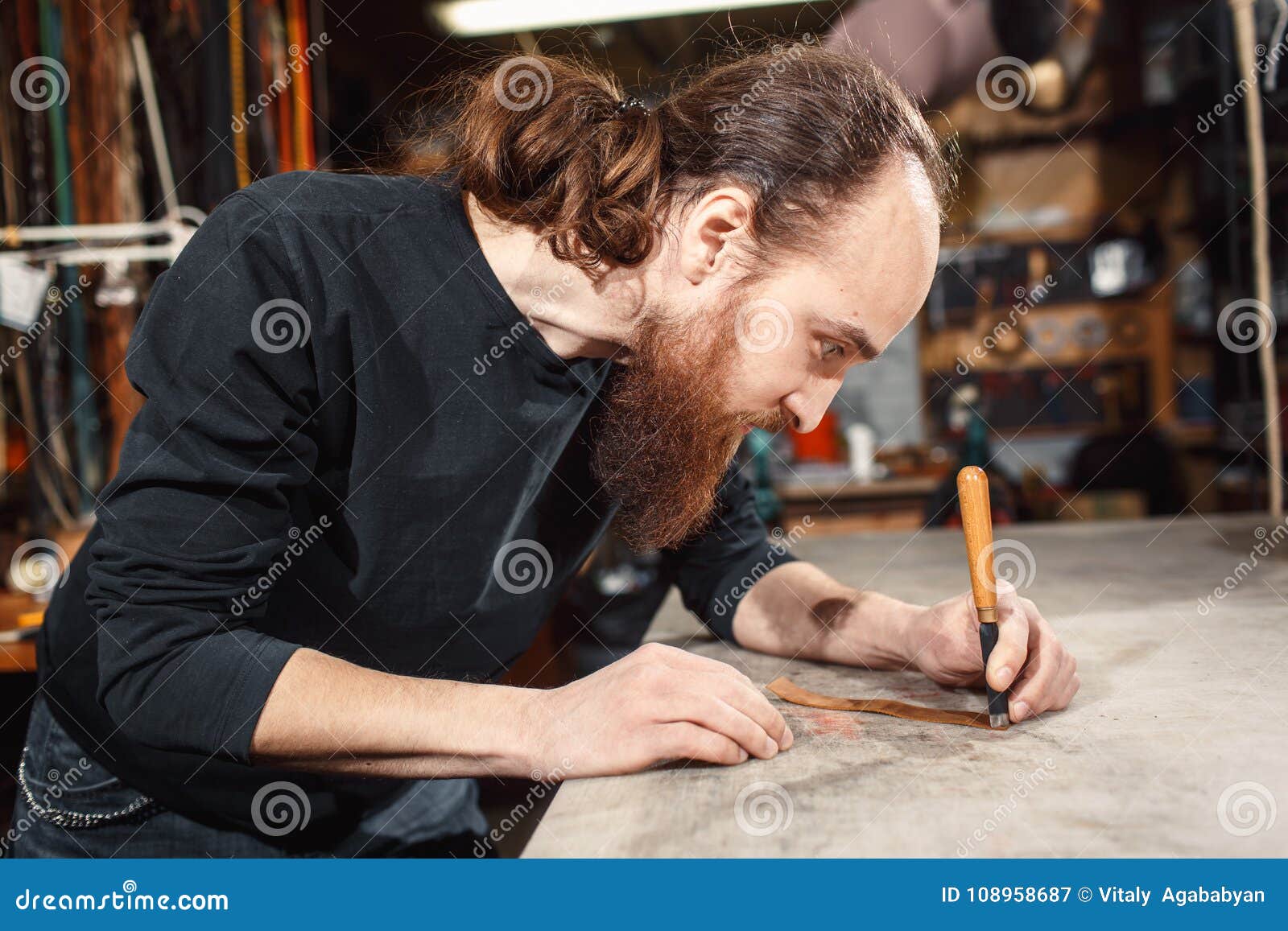 Working Process in the Leather Workshop. Tanner in Old Tannery. Stock ...