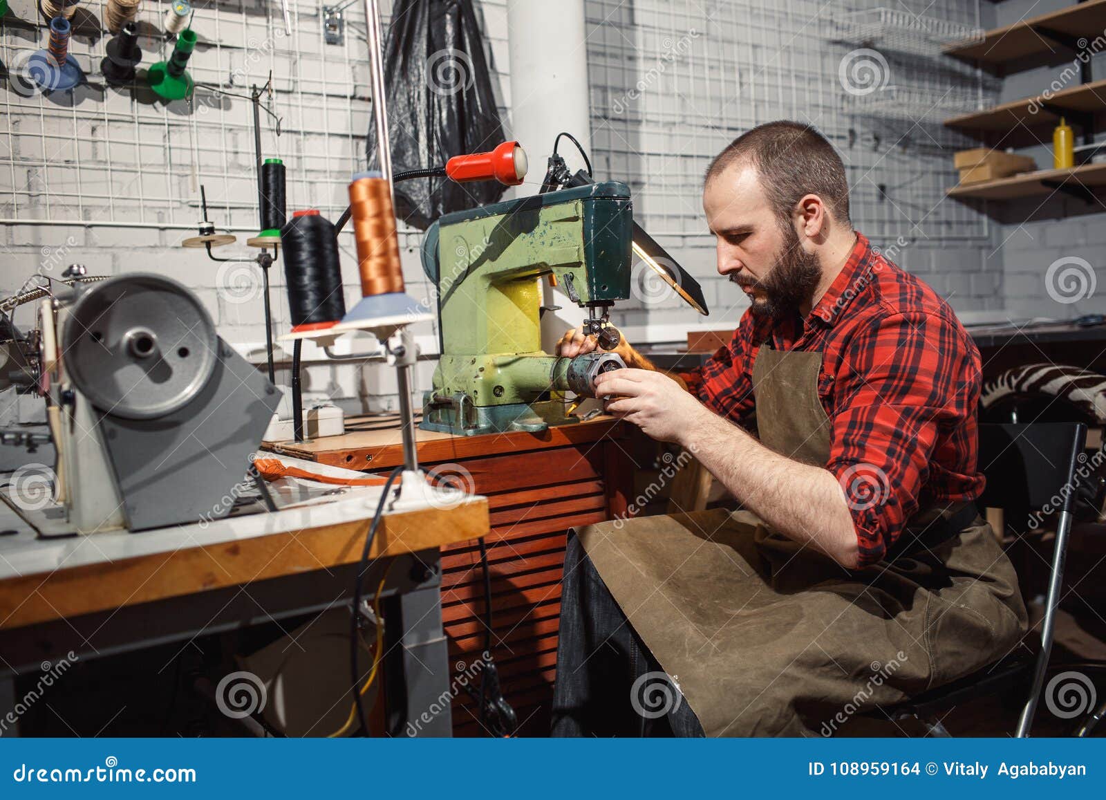 Working Process in the Leather Workshop. Tanner in Old Tannery. Stock ...