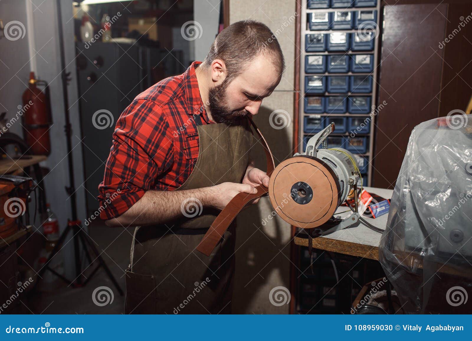 Working Process in the Leather Workshop. Tanner in Old Tannery. Stock ...