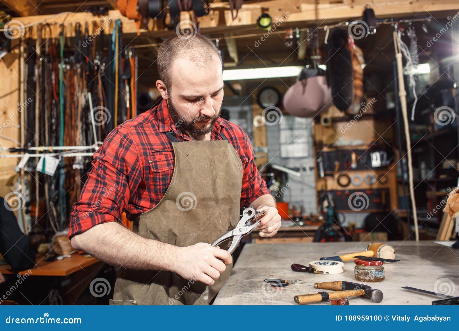 Working Process in the Leather Workshop. Tanner in Old Tannery. Stock ...