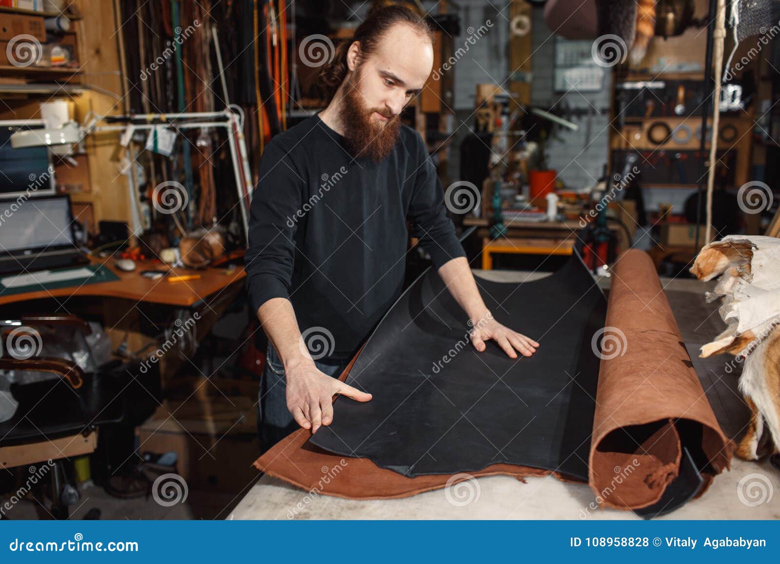 Working Process in the Leather Workshop. Tanner in Old Tannery. Stock ...