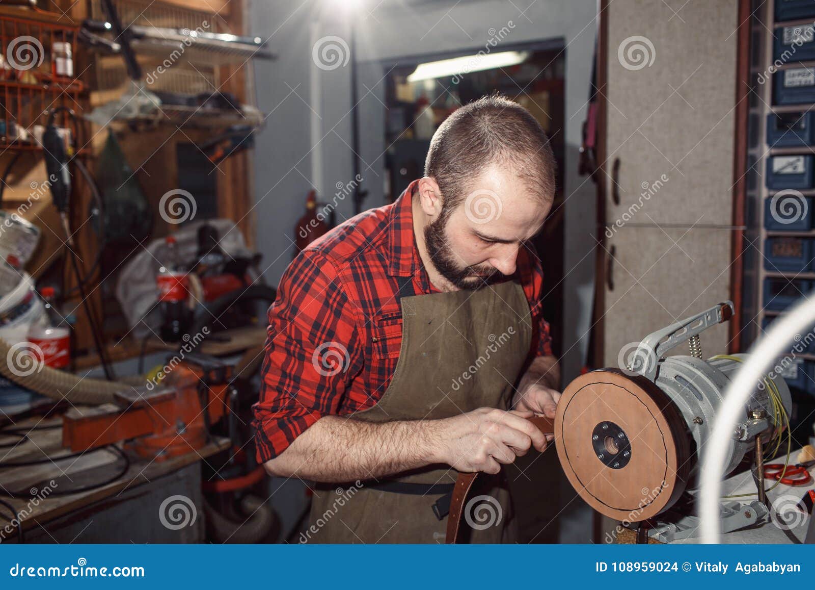 Working Process in the Leather Workshop. Tanner in Old Tannery. Stock ...