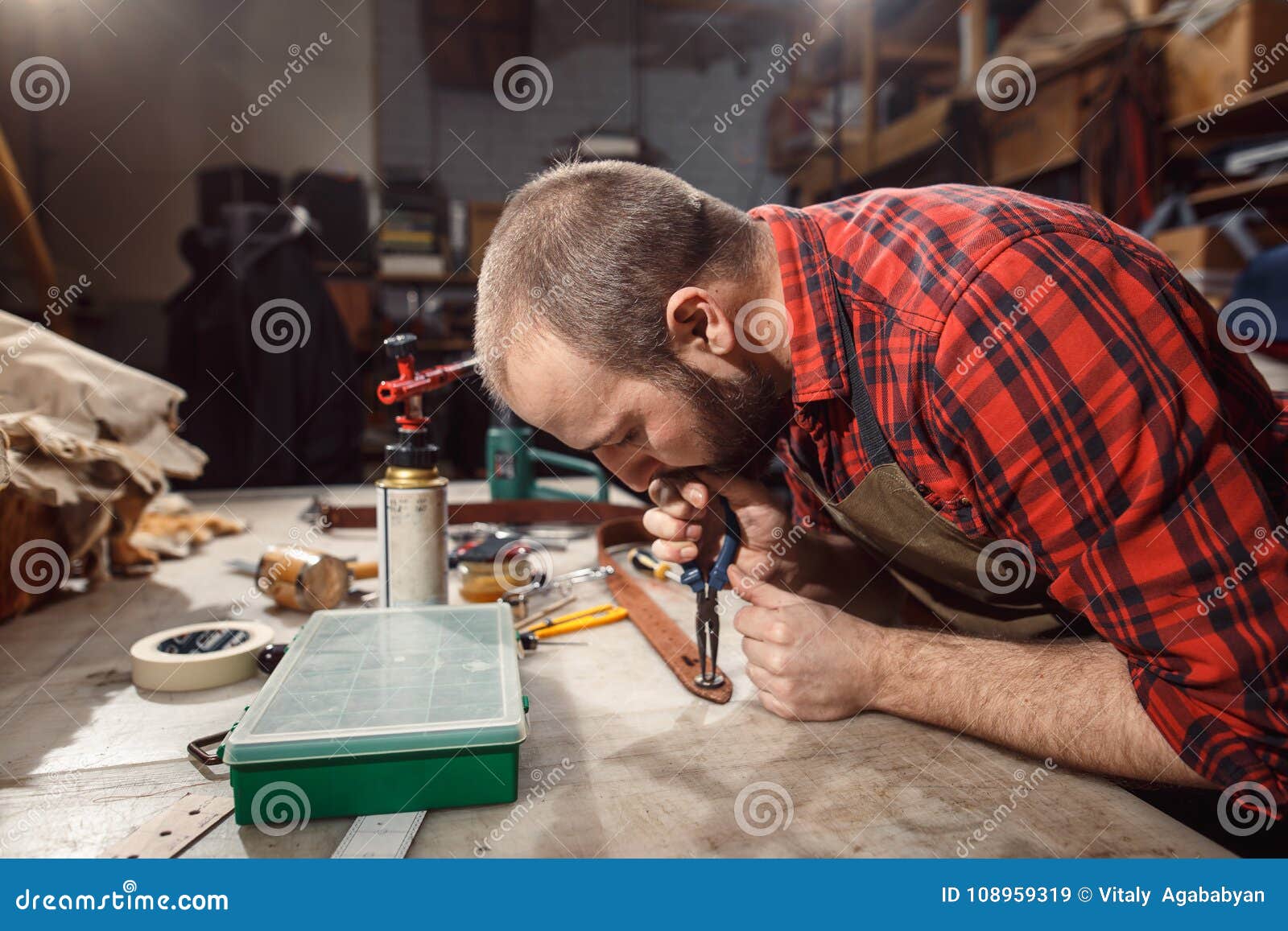 Working Process in the Leather Workshop. Tanner in Old Tannery. Stock ...
