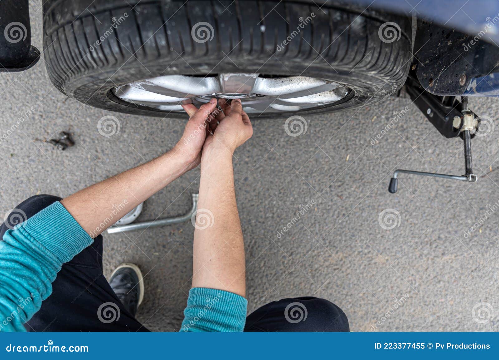 Working Process of Removing the Wheel from the Car Stock Image - Image ...