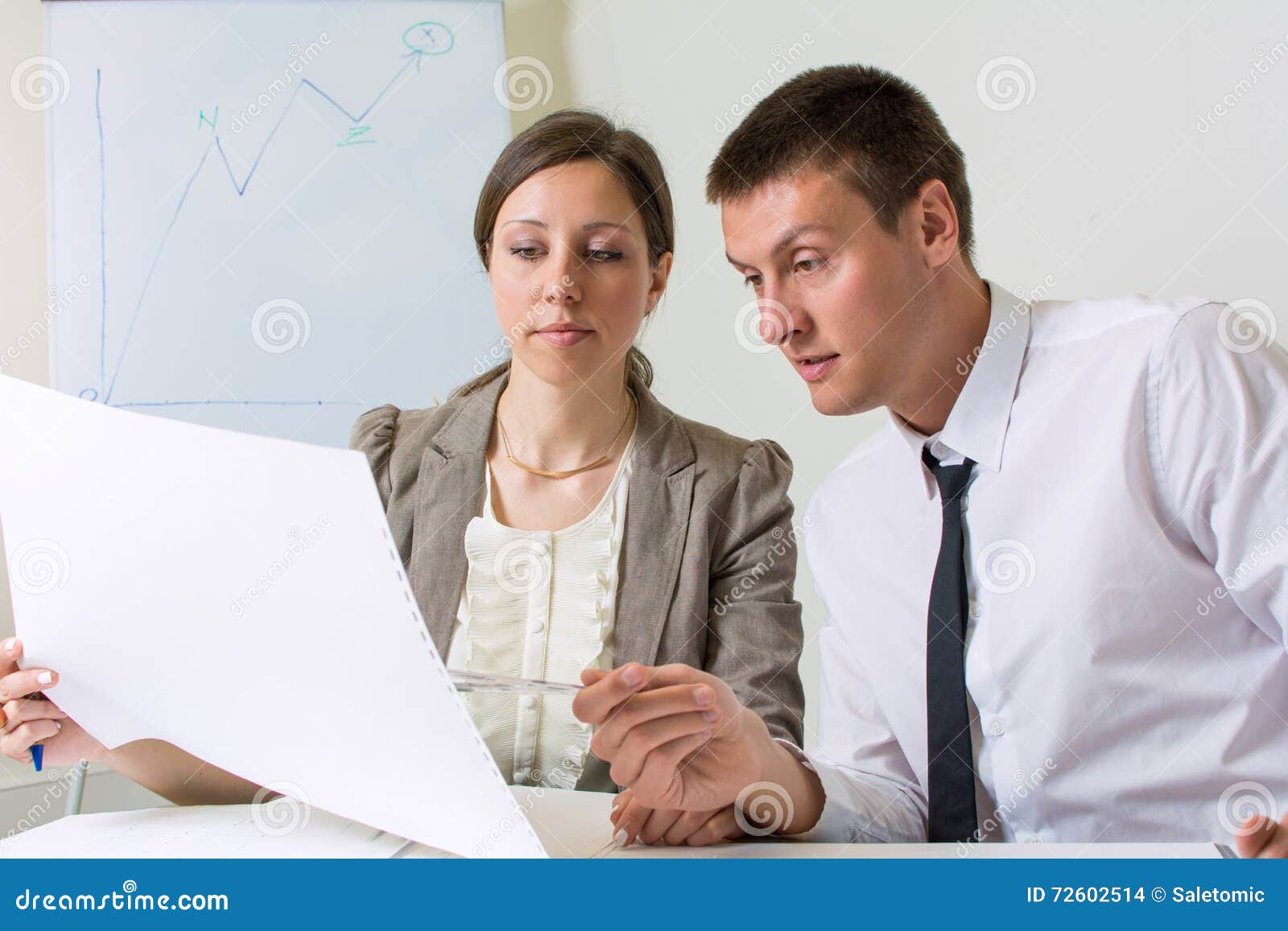 Working on a Project at the Office Stock Photo - Image of male, ideas ...