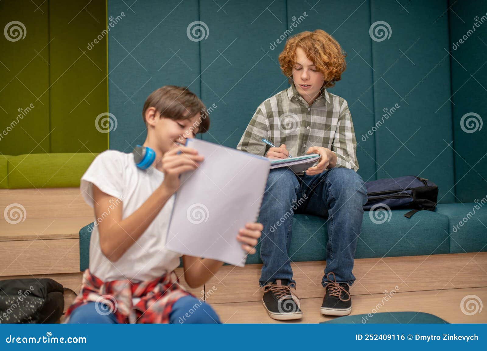 Schoolboys Working Together on the Project and Looking Involved Stock ...