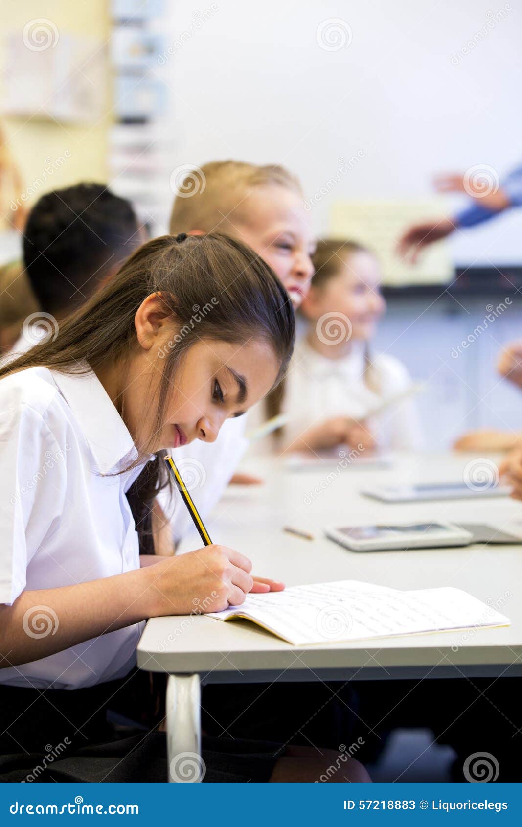 Working at School stock image. Image of desk, ethnicity - 57218883