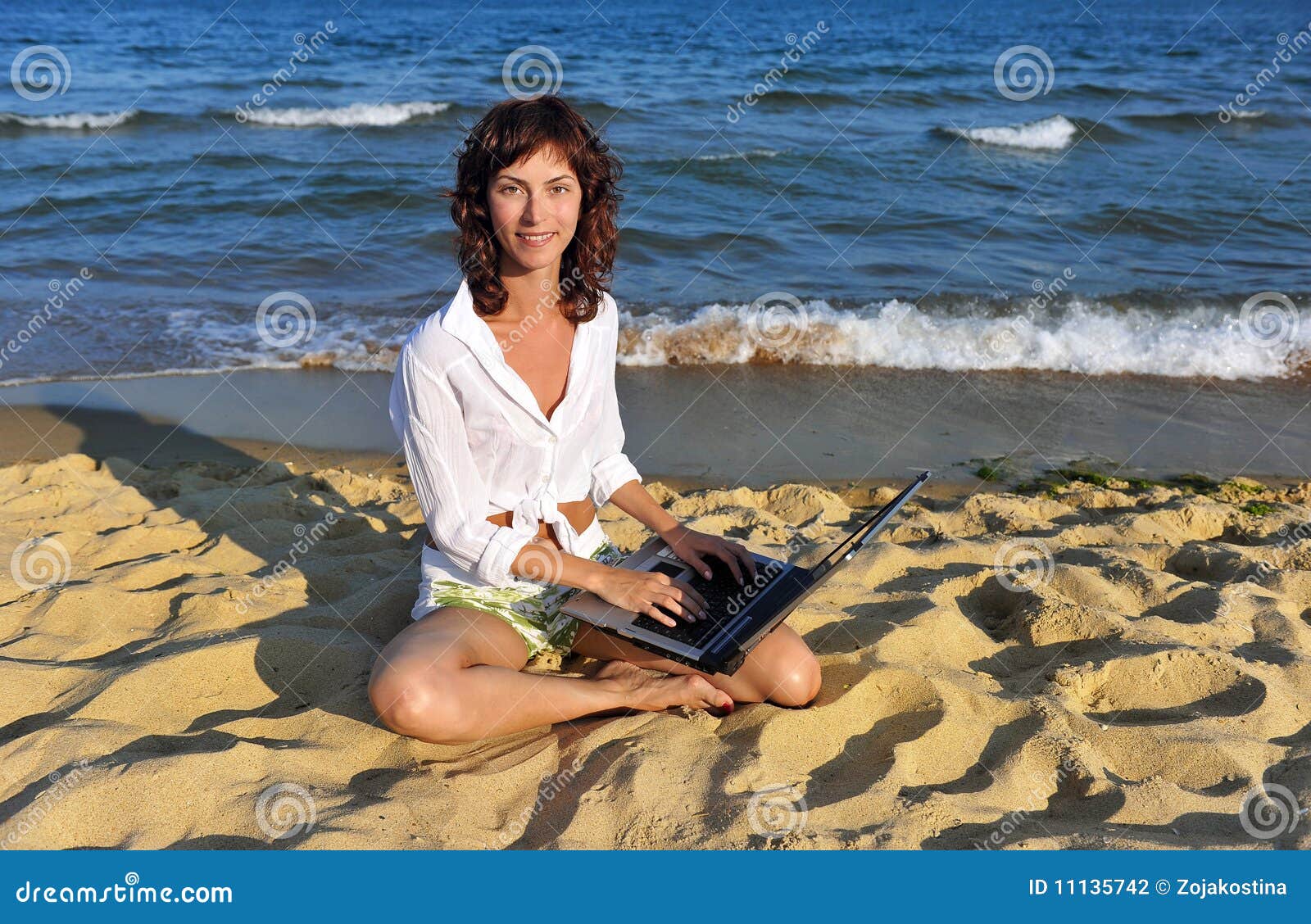 Working at the seaside stock photo. Image of businesswoman - 11135742