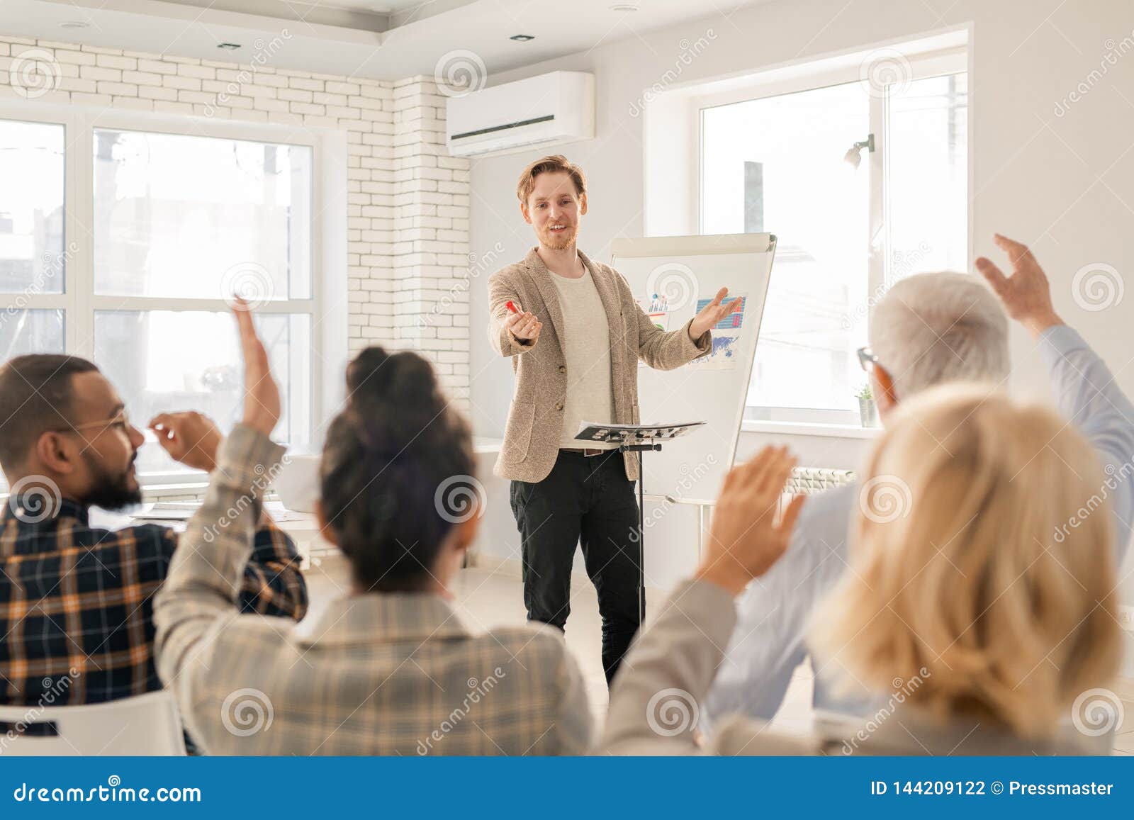 Working at seminar stock photo. Image of pointing, education - 144209122