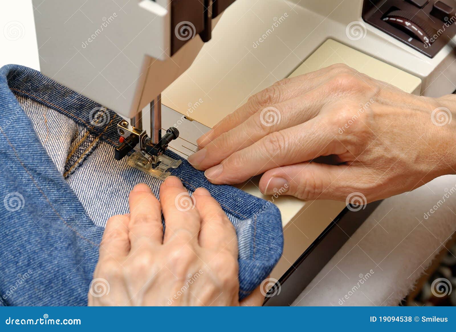 Working on a Sewing Machine Stock Photo - Image of material, female ...
