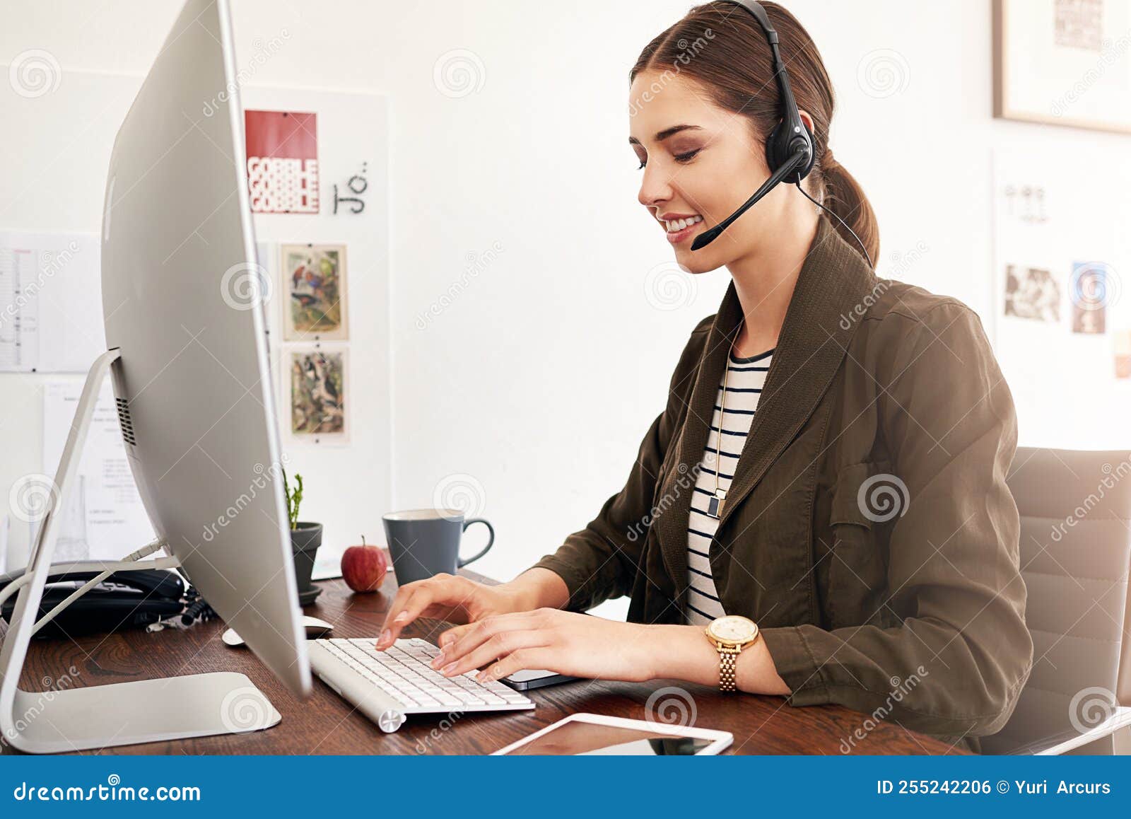 Working on a Solution. a Young Businesswoman Working in Her Office ...