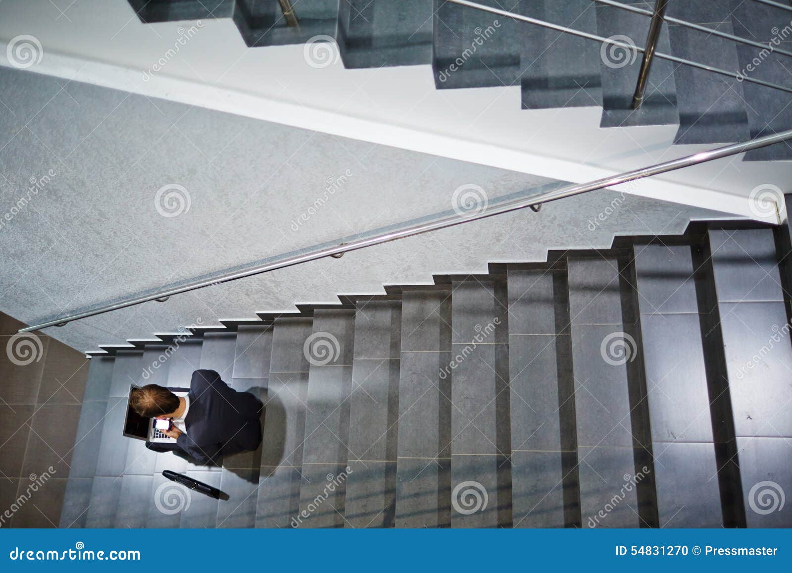 Working on stairs stock photo. Image of planning, adult - 54831270