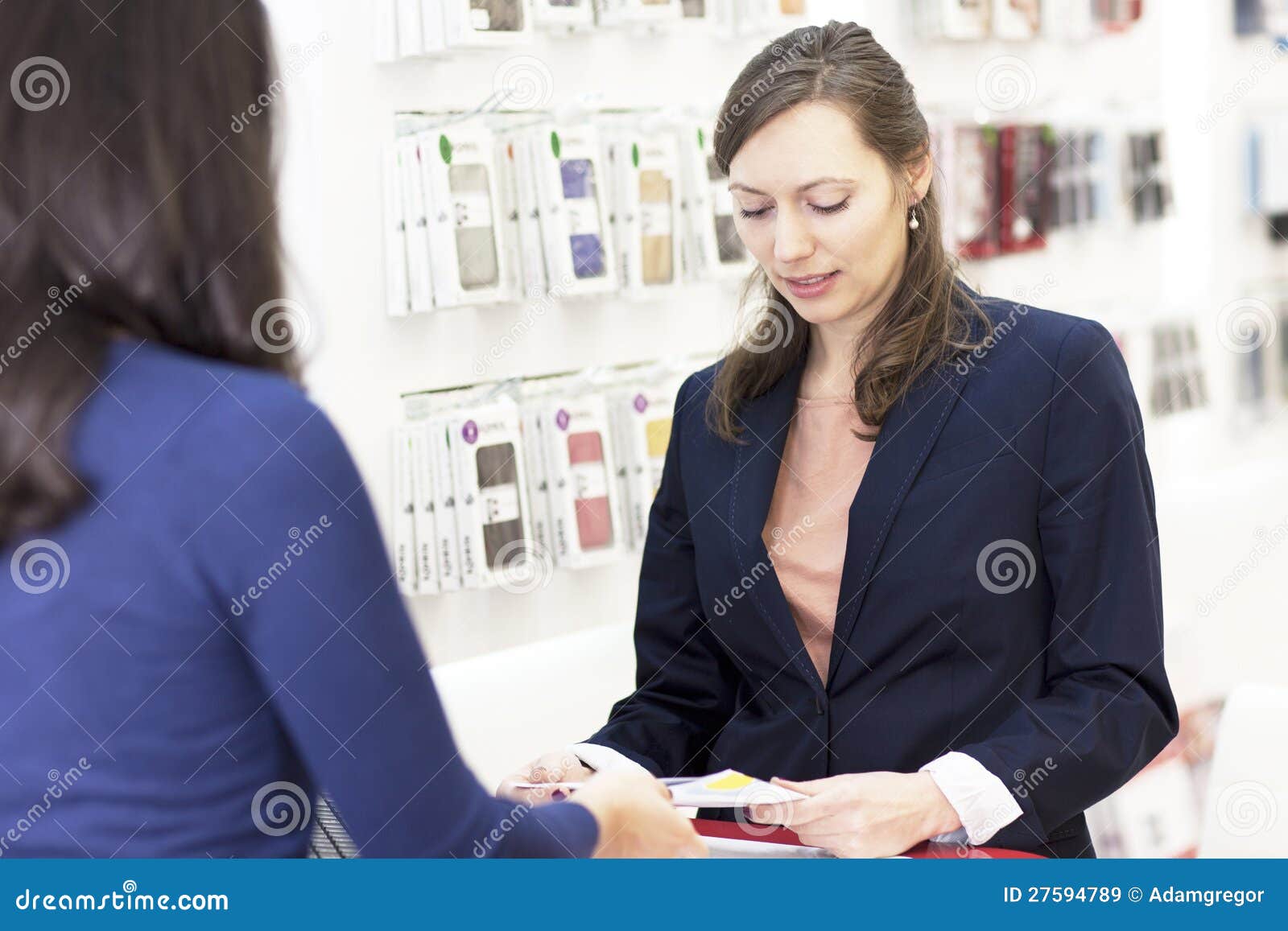 Working in a Store with Smart Phones Stock Image - Image of adult ...