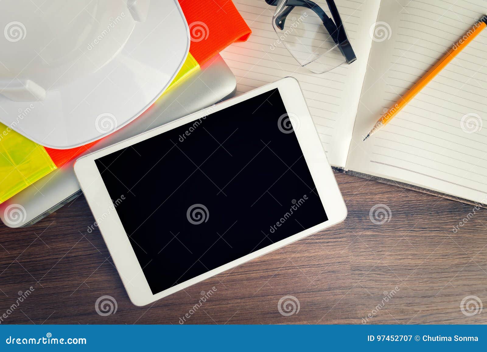 Working Table Engineer with Tablet and Tools in Oil Refinery Industry ...