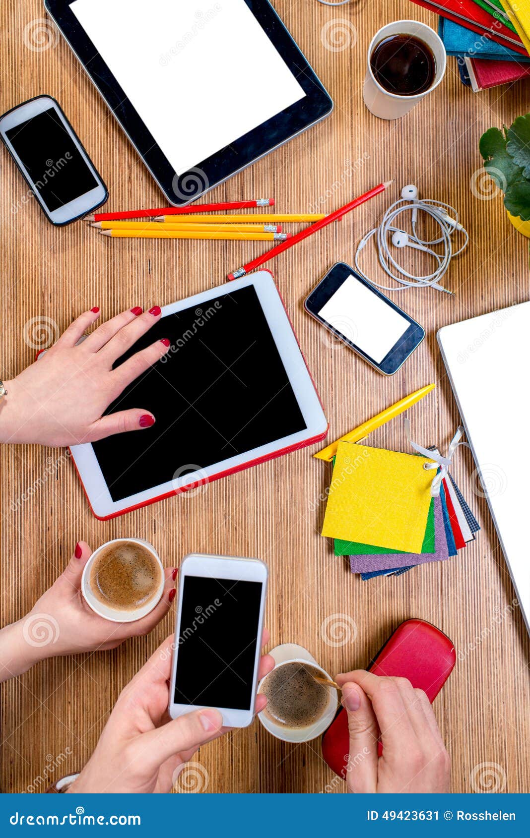 Working on Table with Gadgets Stock Image - Image of group, phone: 49423631