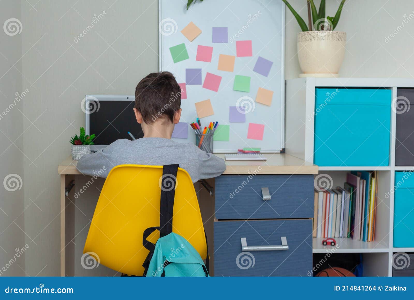 Working Table in Kid`s Room. Child Does Homework at the Table in Modern ...