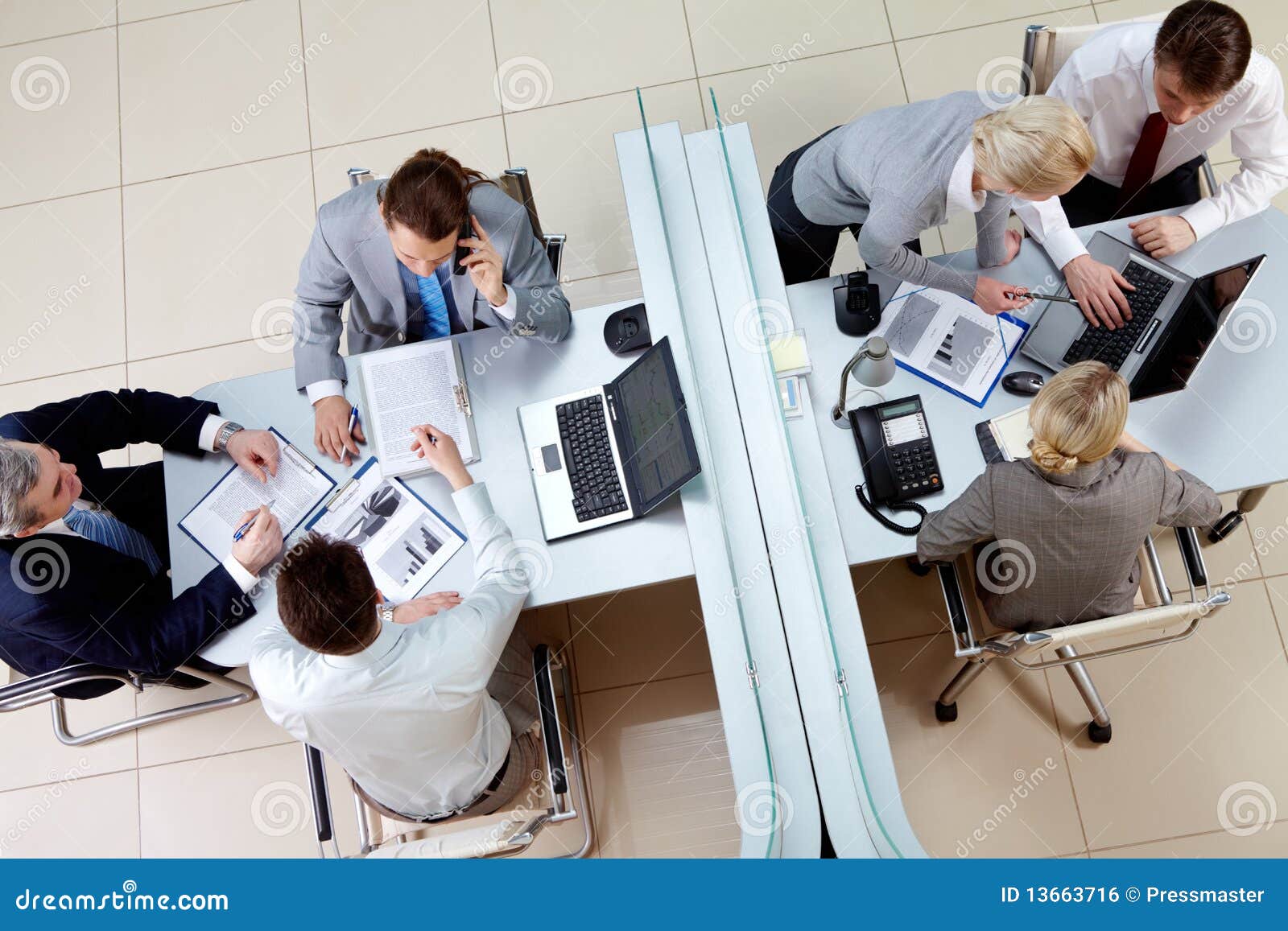 Working teams stock photo. Image of business, paperwork - 13663716
