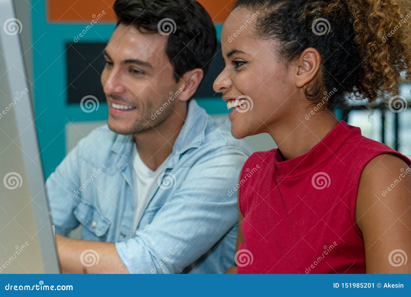 Working Couple Happy with Working Together in Office with Computer ...