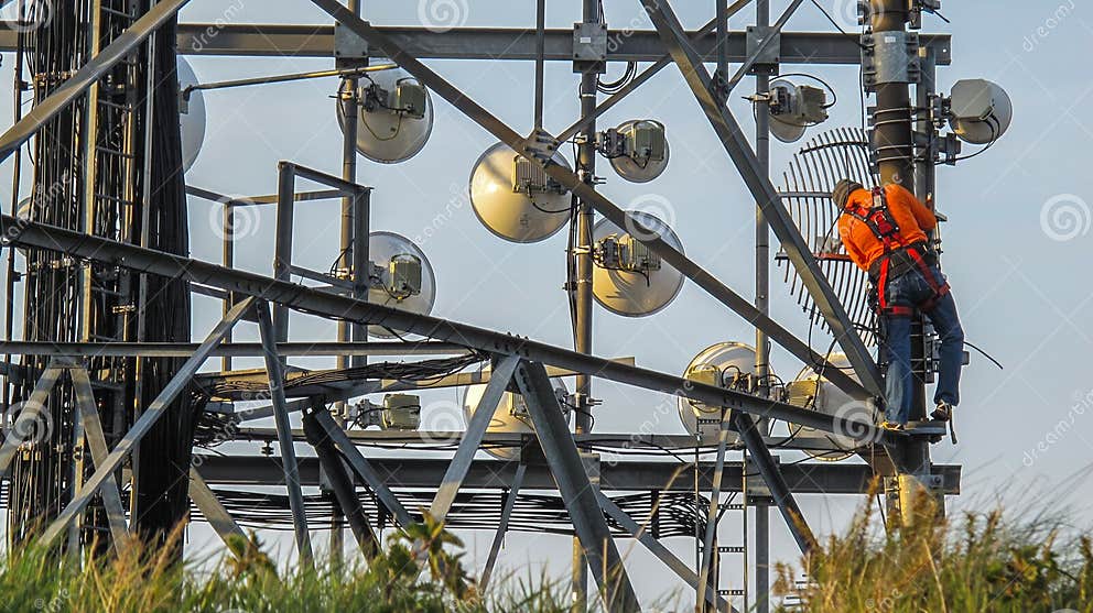 Working Technician Up a Telecommunications Tower Stock Image - Image of ...