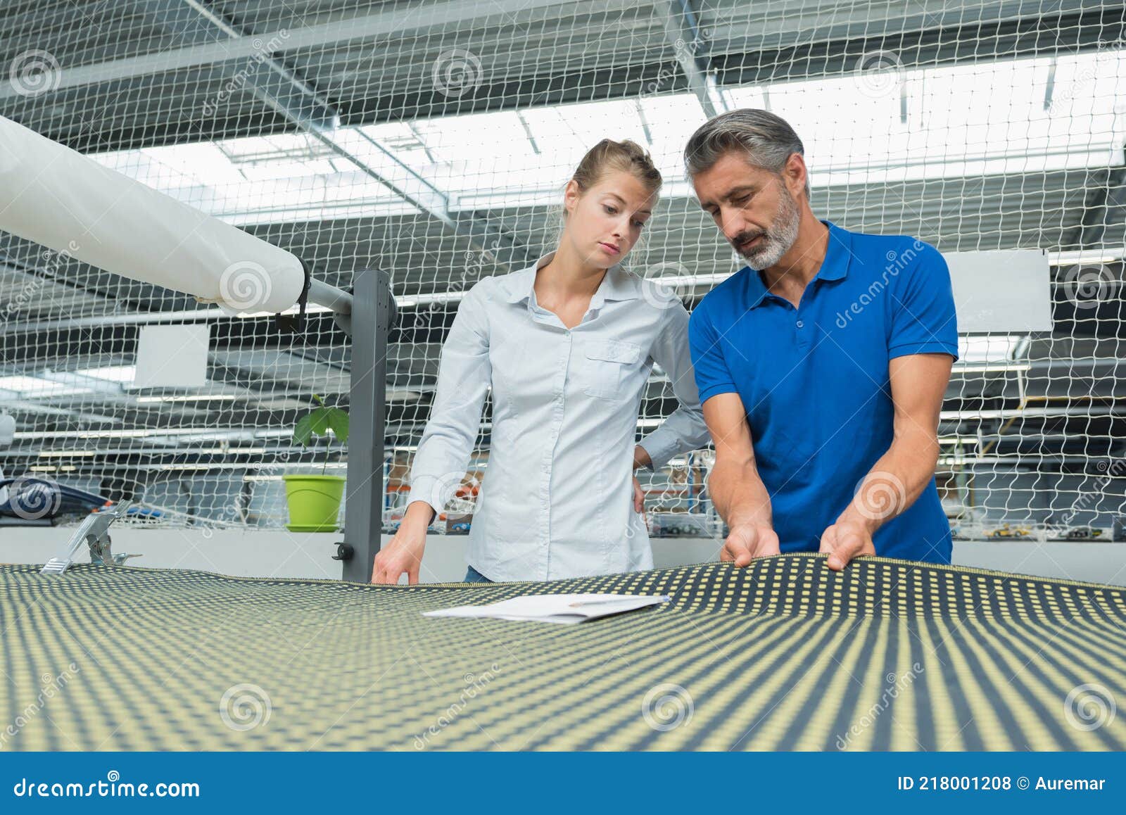 Working in textile factory stock photo. Image of machine - 218001208