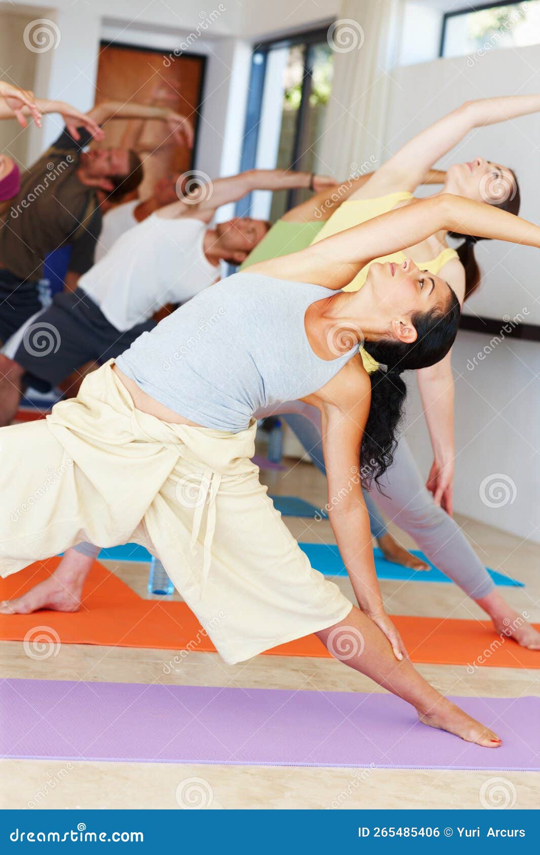Working Their Bodies and Minds. a Diverse Group of Yoga Students ...