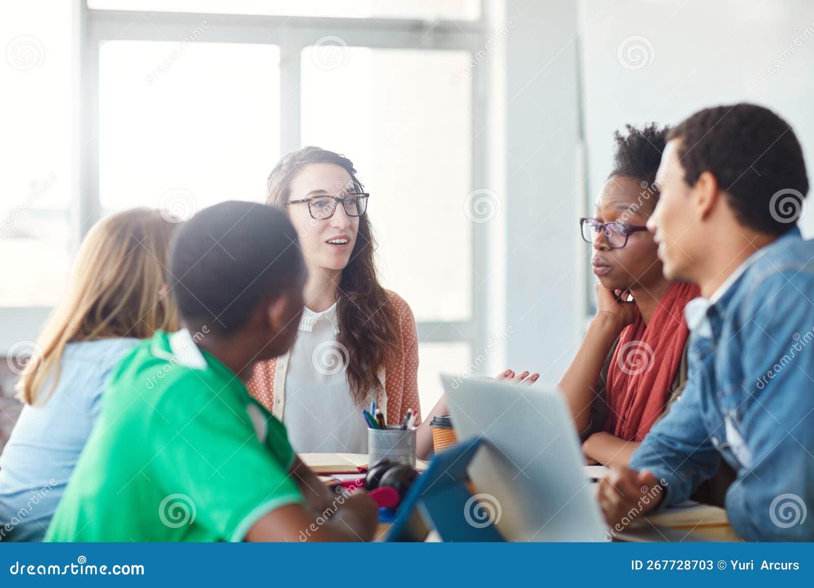 Working on Their Group Project. a Group of University Students Working ...