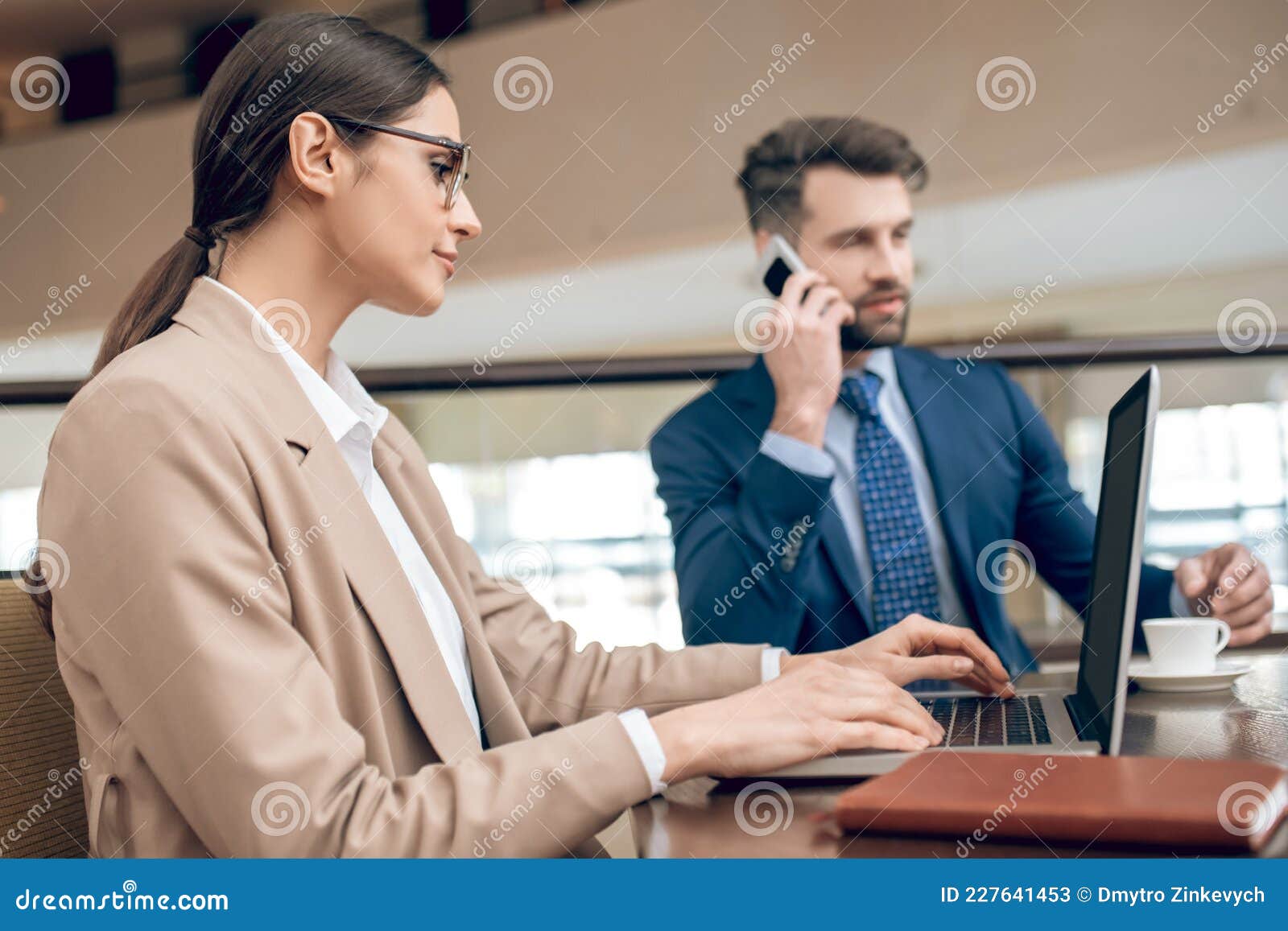 Business Partners Working Together on a Project in the Office Stock ...