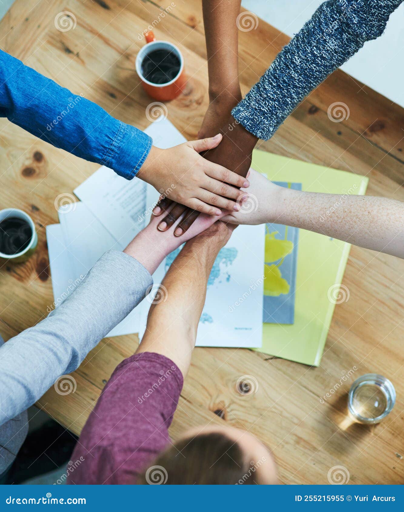 Working Together. a Group of Hands Reaching Forward Together. Stock ...