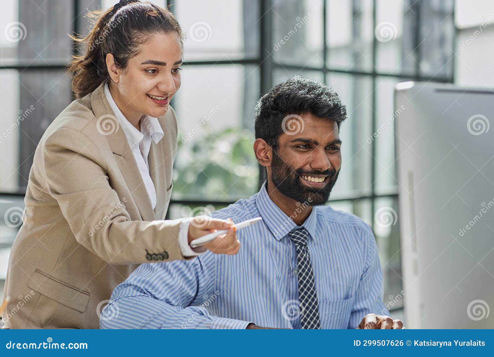 Working Together on Project. Two Young Business Colleagues Working on ...