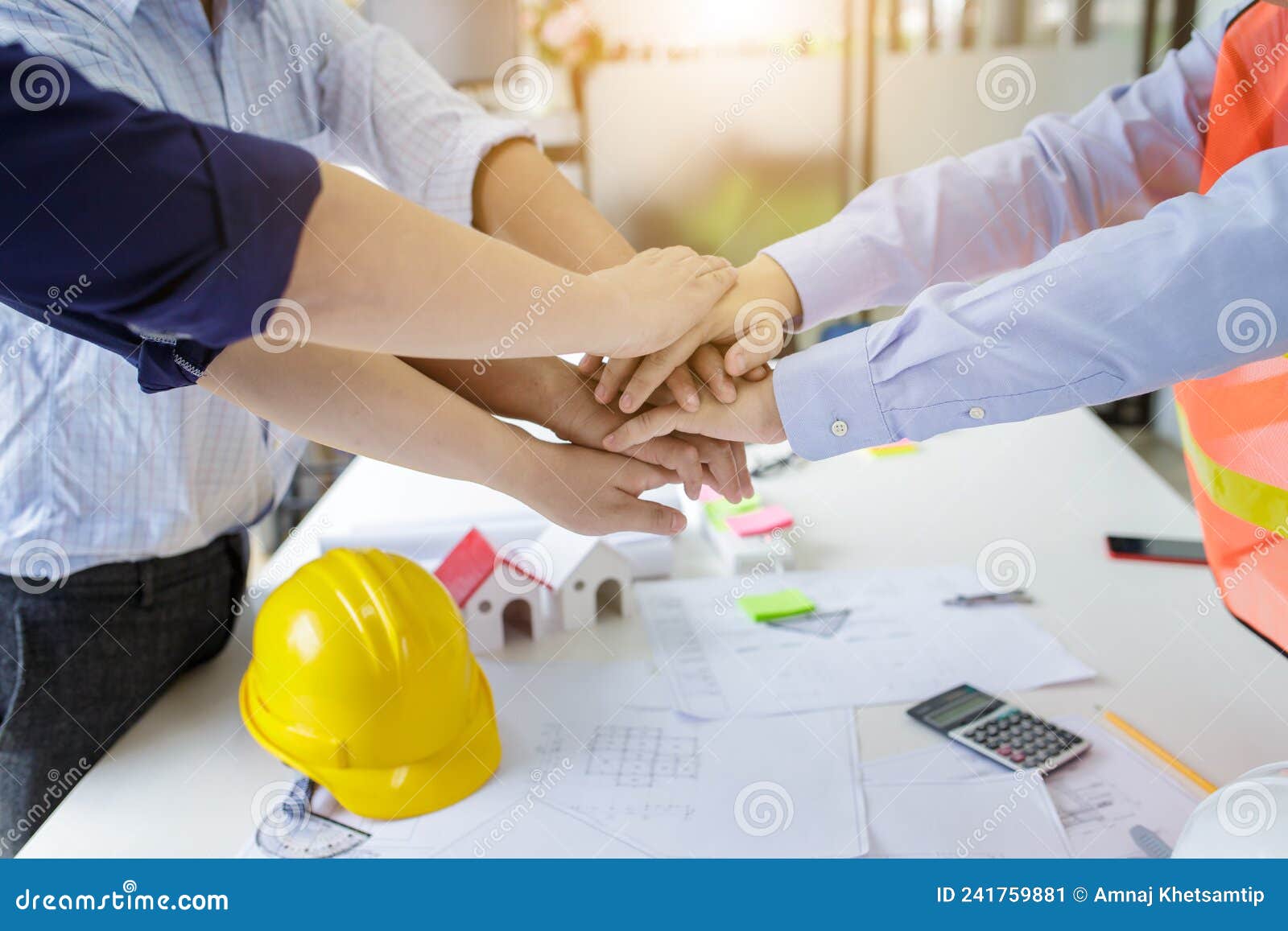 Working Together Teamwork. Group of Engineers Working Together To Plan ...