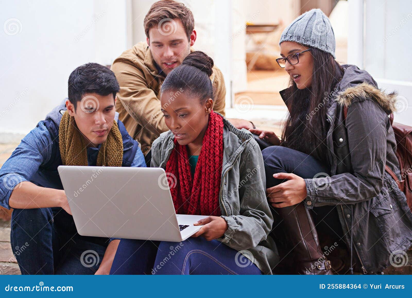 Working Together on Their Research Project. University Students Using a ...
