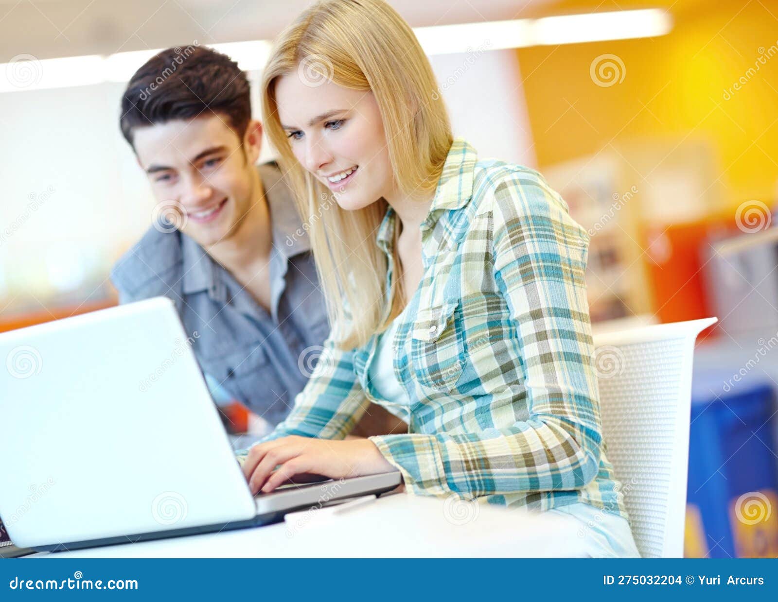 Working Together To Get the Project Done. Two Smiling Students Helping ...