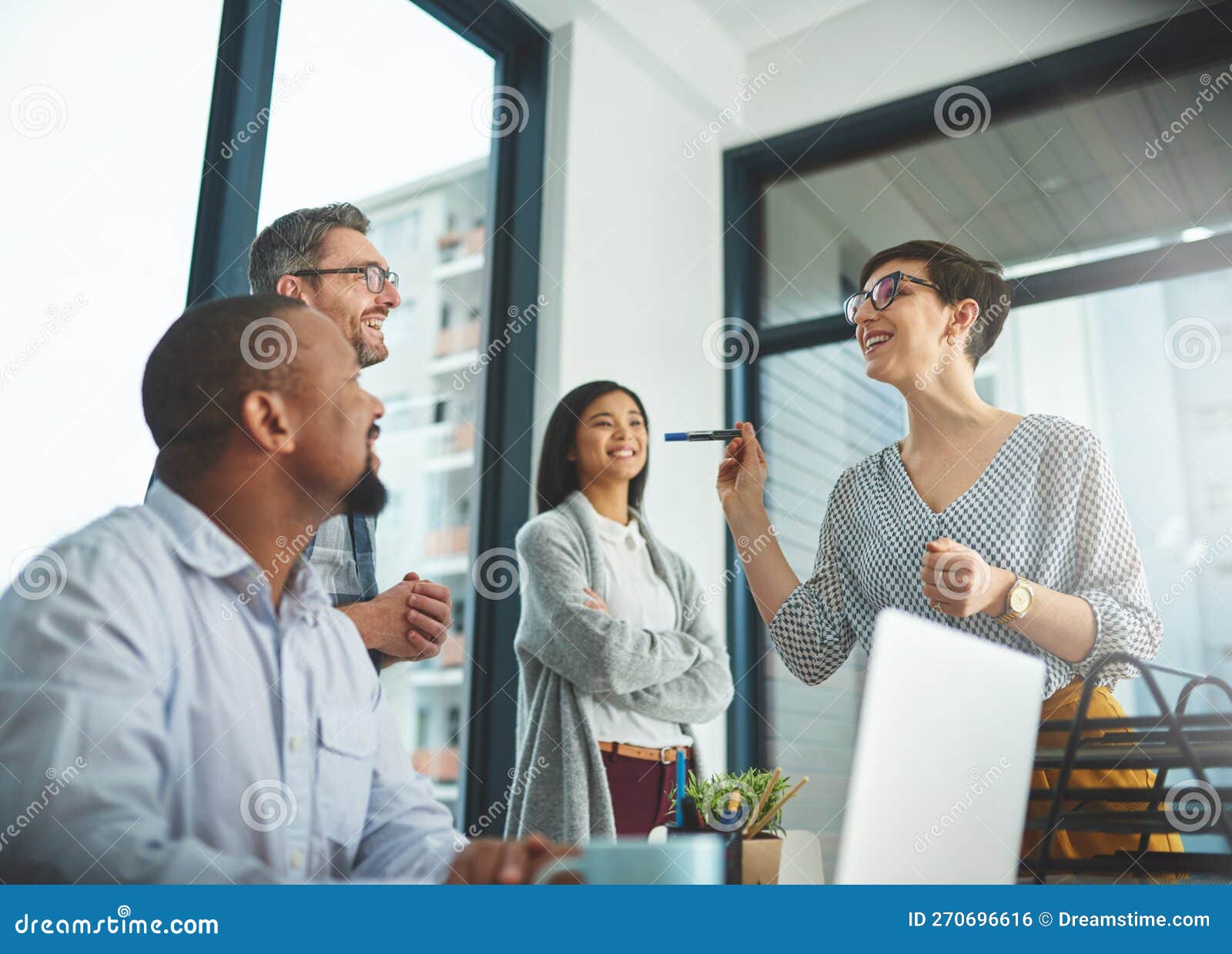 Working Together To Get the Task Done. Shot of Businesspeople Working ...