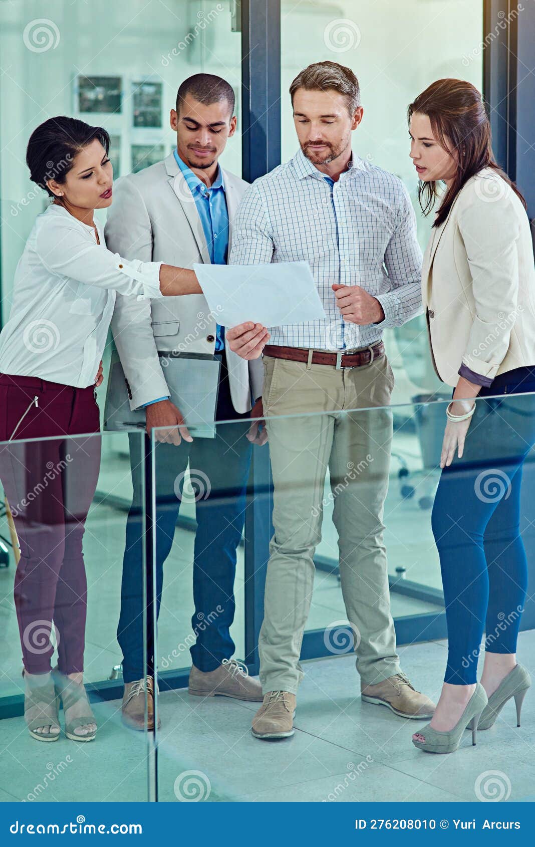 Working Together Towards the Same Goal. a Group of Coworkers Talking ...