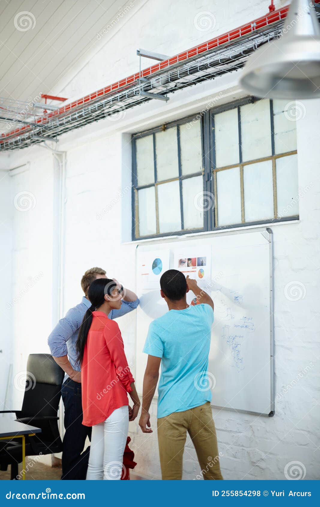 Working Together Towards Their Vision. a Group of Young Designers ...