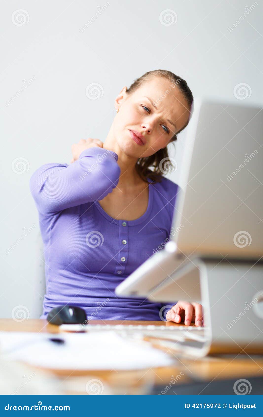 Working Too Hard - Young Woman Working on a Computer Stock Photo ...