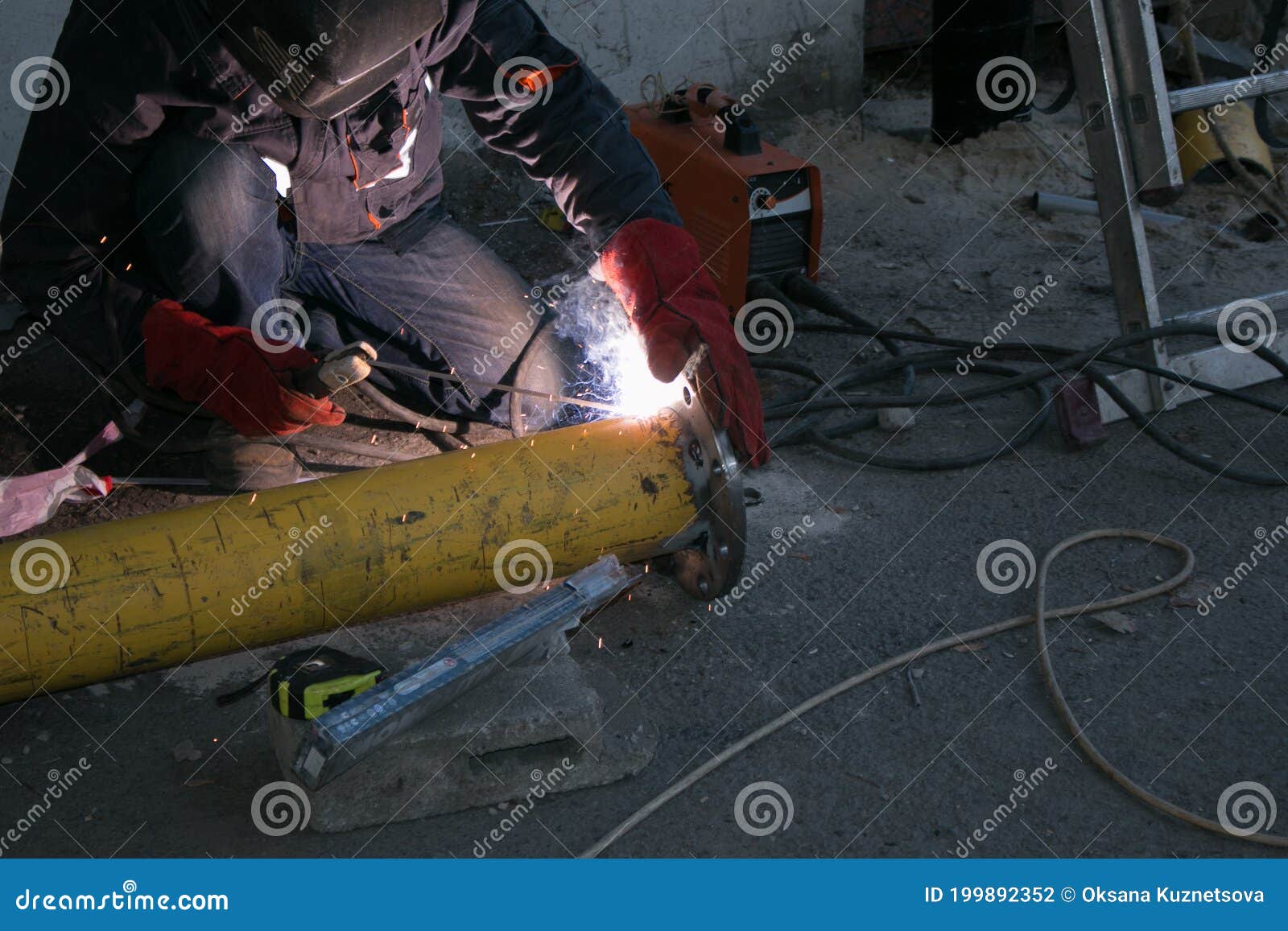 Working with the Tool. Hands of a Man Working with a Welding Machine ...