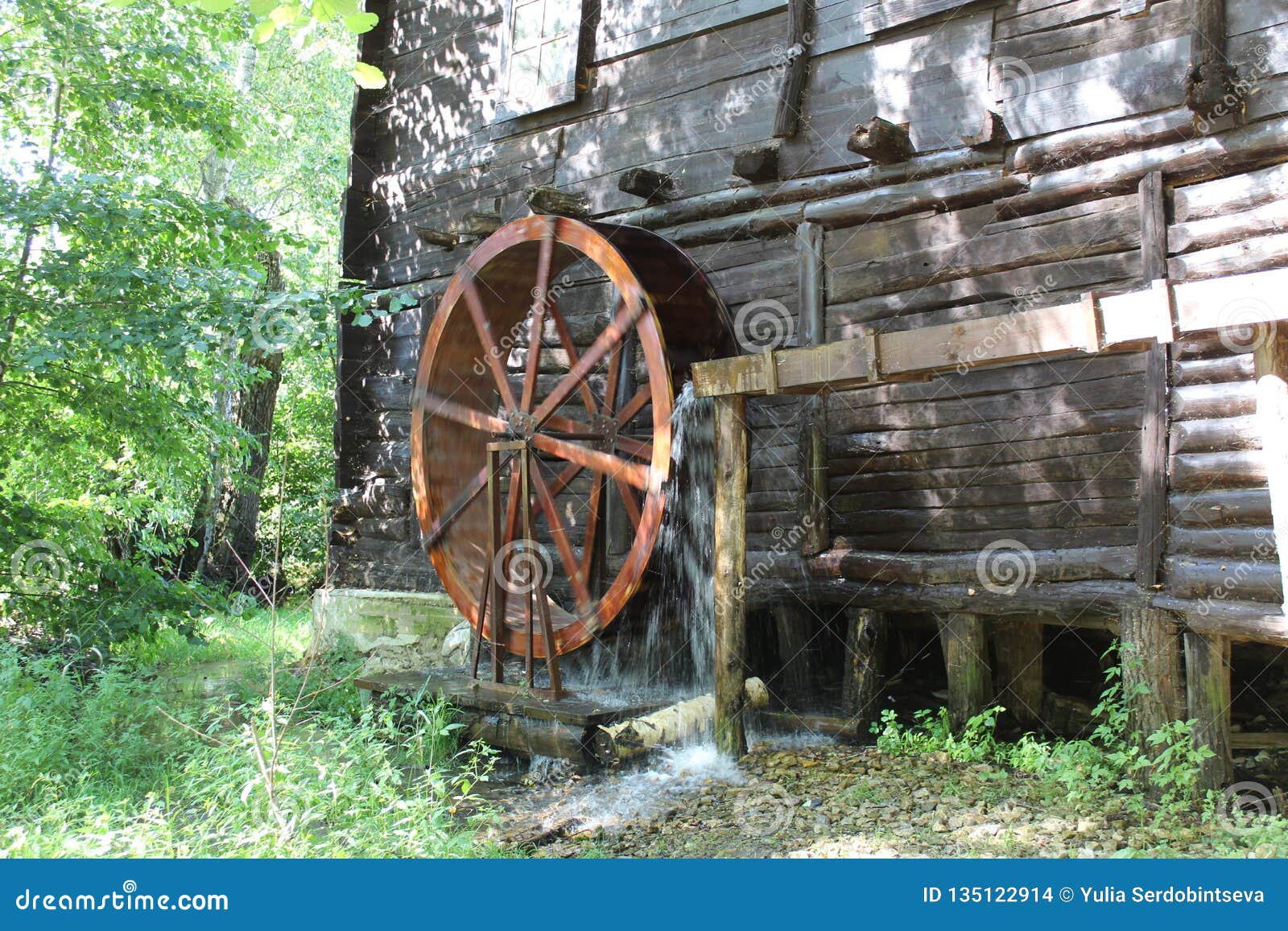 Working Watermill Wheel with Falling Water in the Village Stock Photo ...