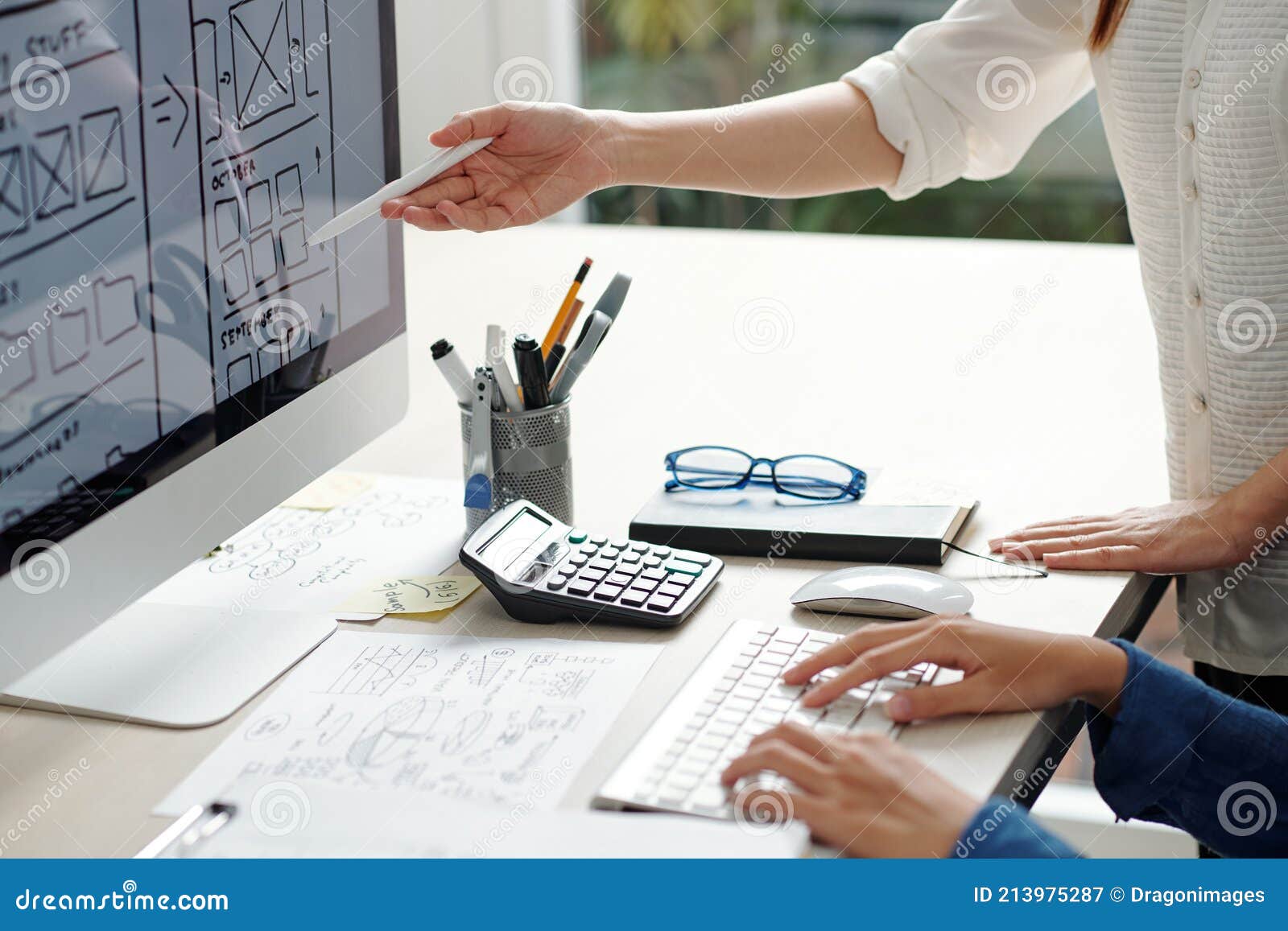 Working on webpage layout stock image. Image of people - 213975287