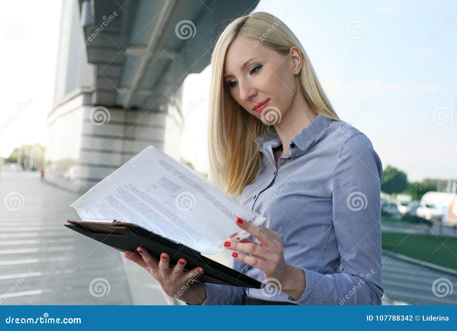 Working Woman Reading Document Outdoors. Stock Photo - Image of read ...