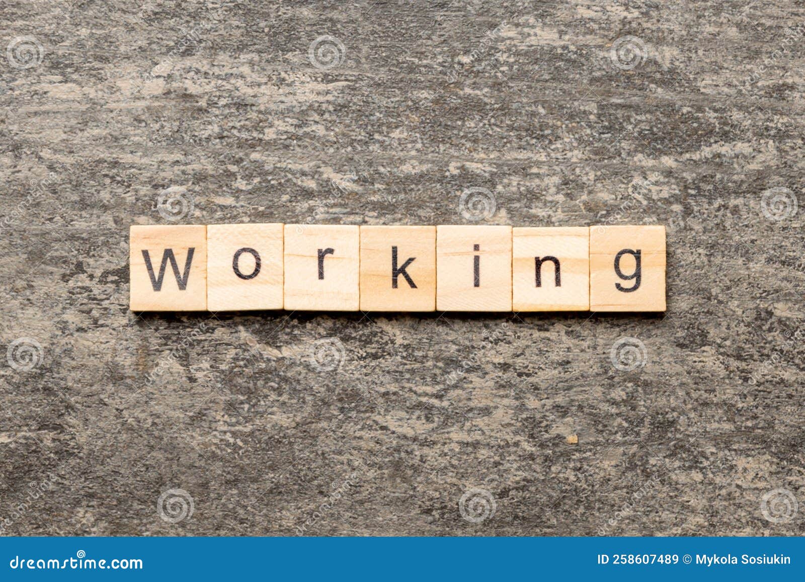 WORKING Word Written on Wood Block. WORKING Text on Cement Table for ...