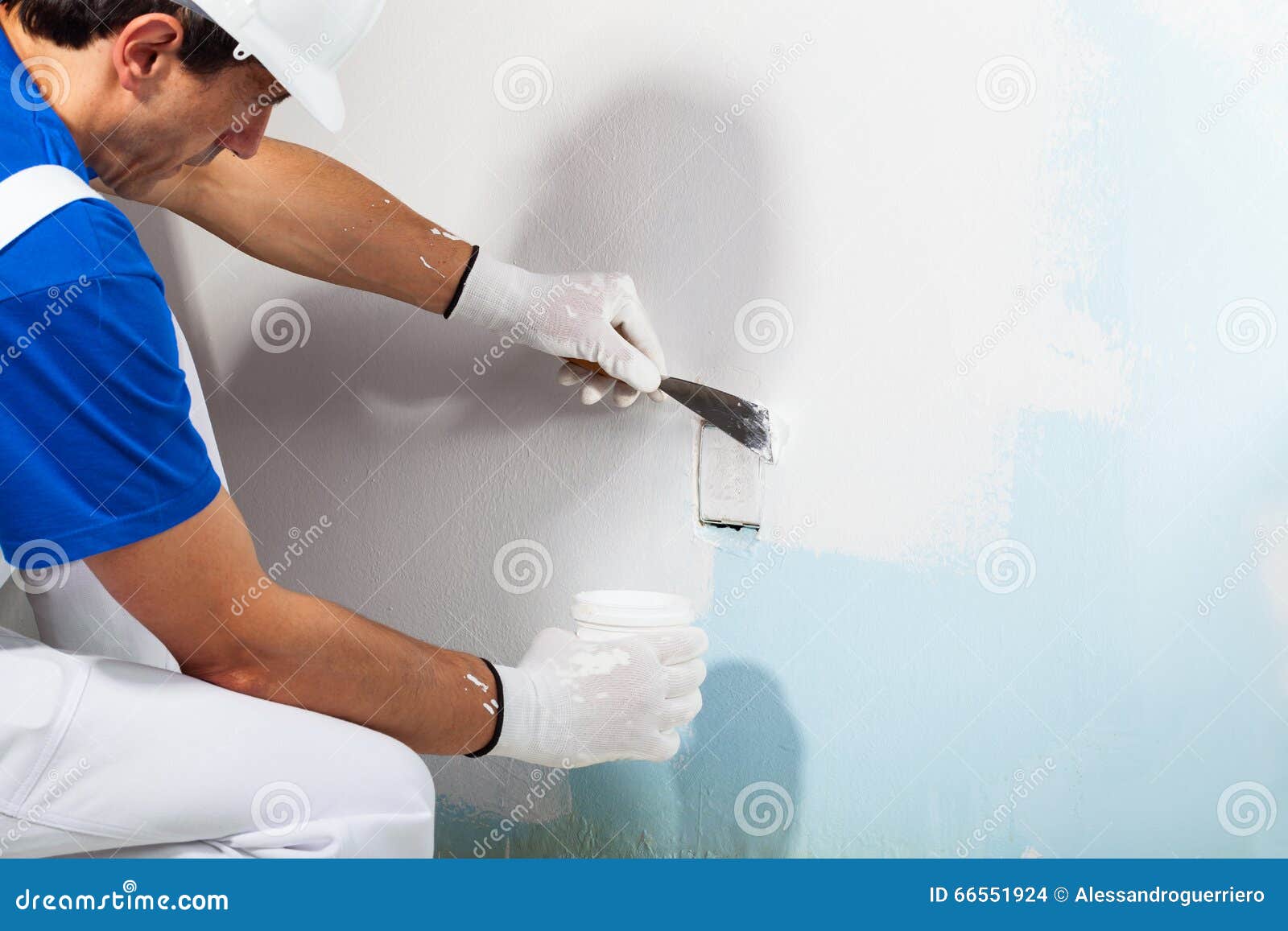 Workman Applying Plaster with Putty Knife Stock Photo - Image of ...