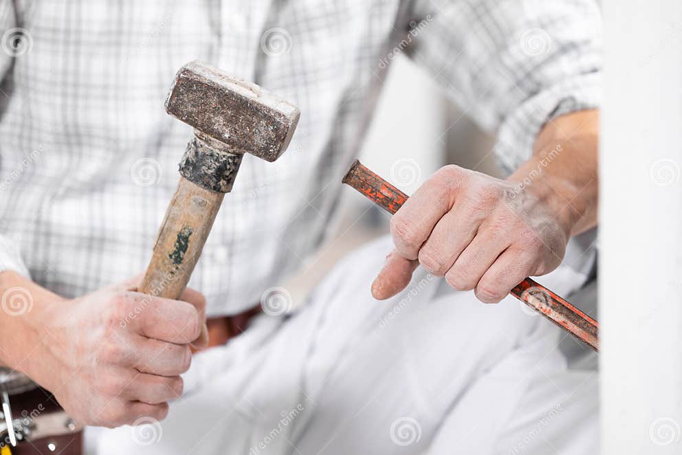 Workman or Builder Using a Mallet and Chisel Stock Photo - Image of ...